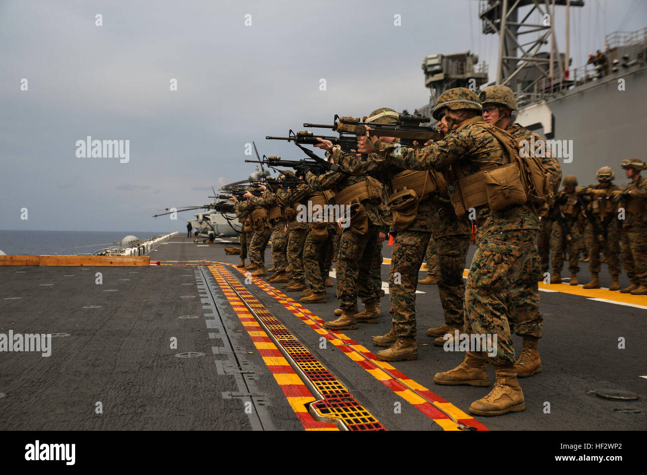 U.S. Marines shoot their M16 rifles during a live-fire exercise Feb. 4 ...