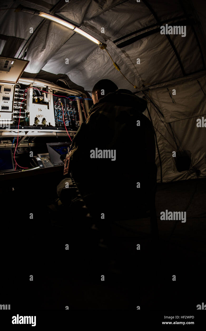 U.S. Marine Corps Lance Cpl. Eric J. Sander, a tactical data systems ...