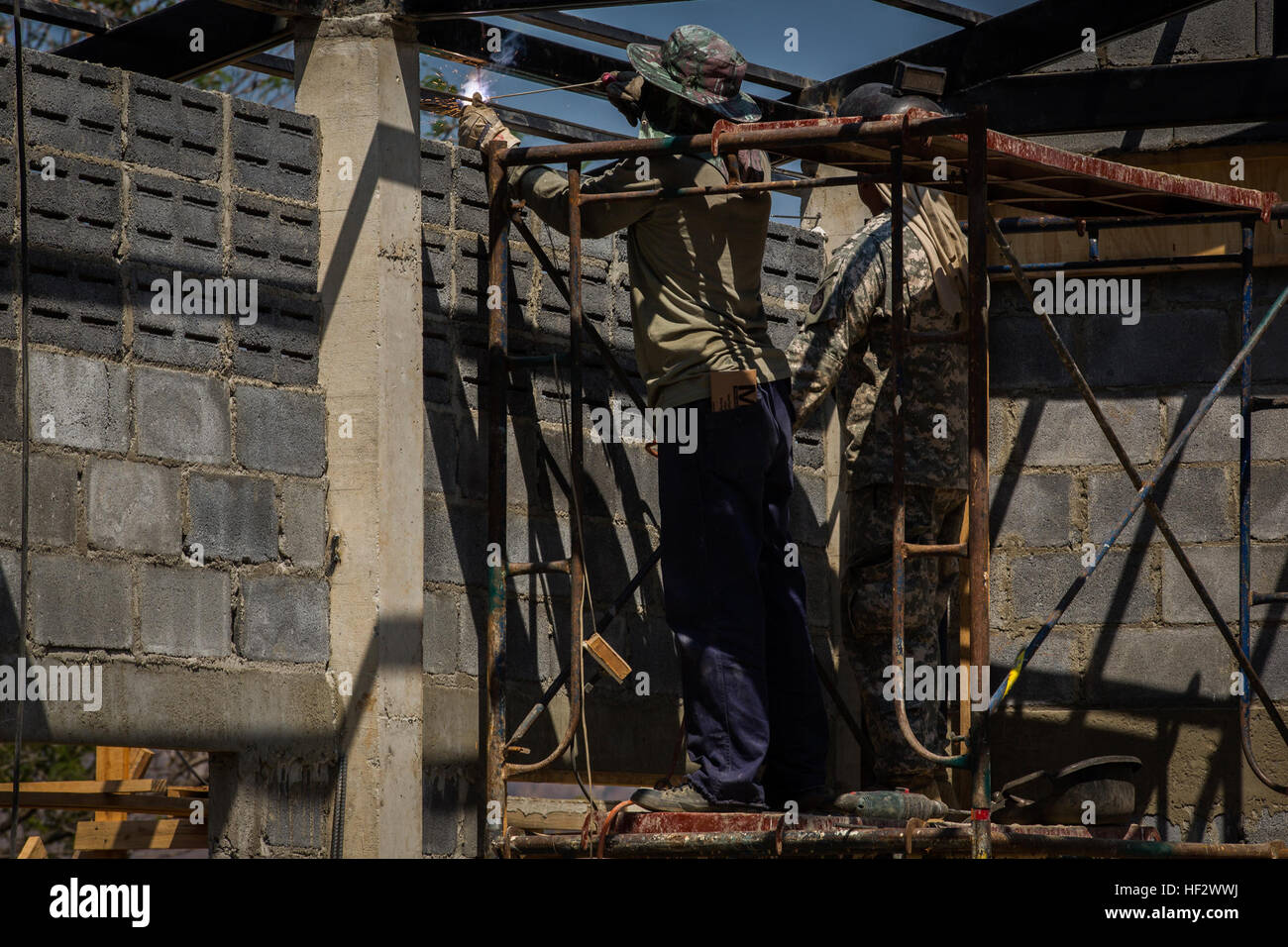 U.S. Army Staff Sergeant Gilbert Blas, vertical engineer, with 176th ...
