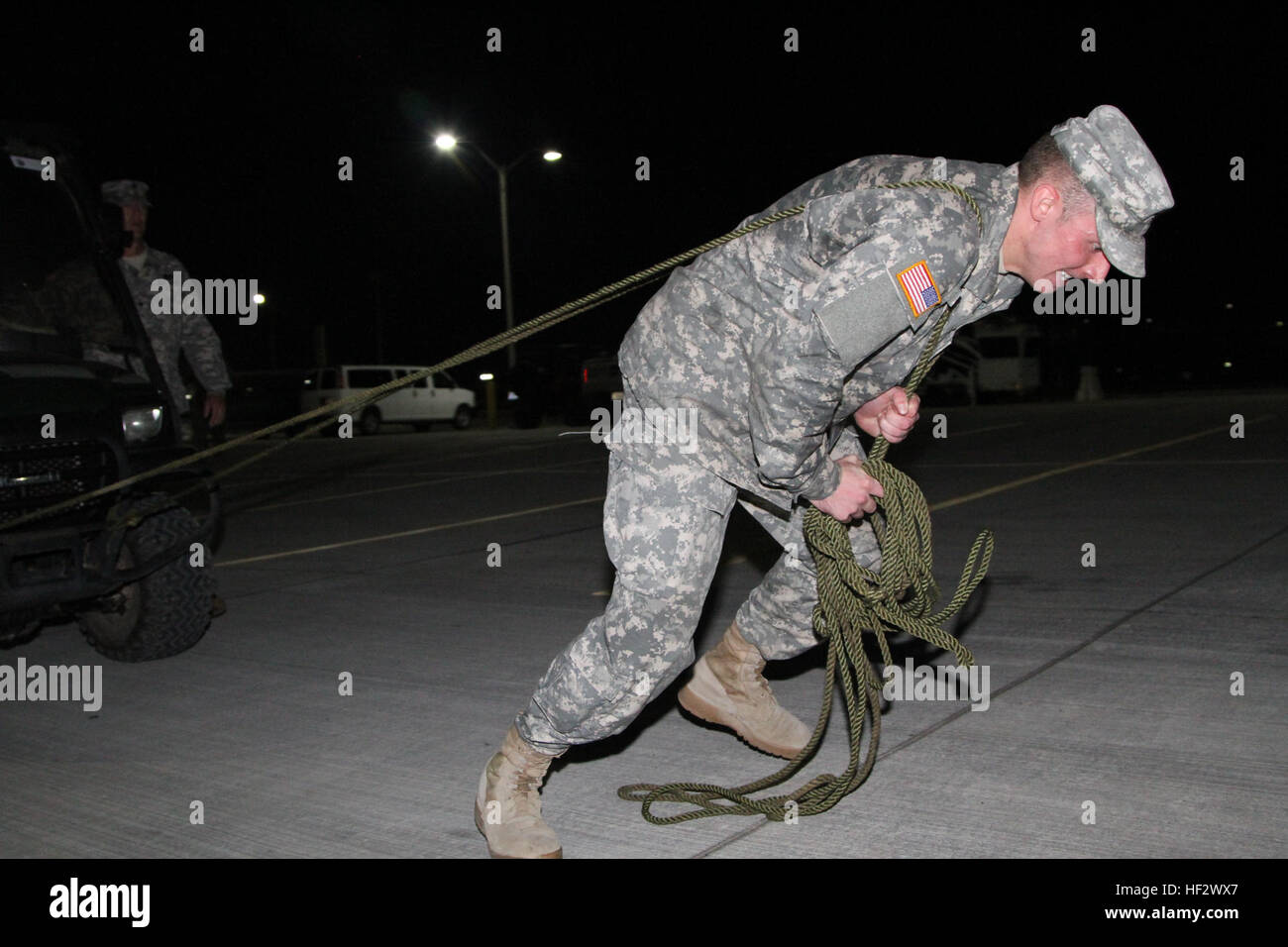 Soldiers of the 525th Military Police Battalion compete in a modified ...
