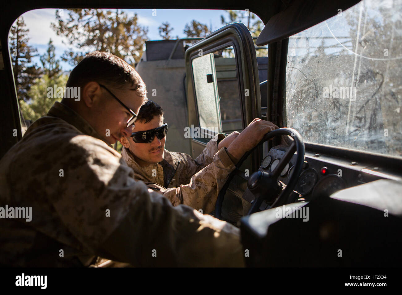 U.S. Marines Pfc. Cody Senkbeil, left, Lance Cpl. Ryan Waters, motor ...