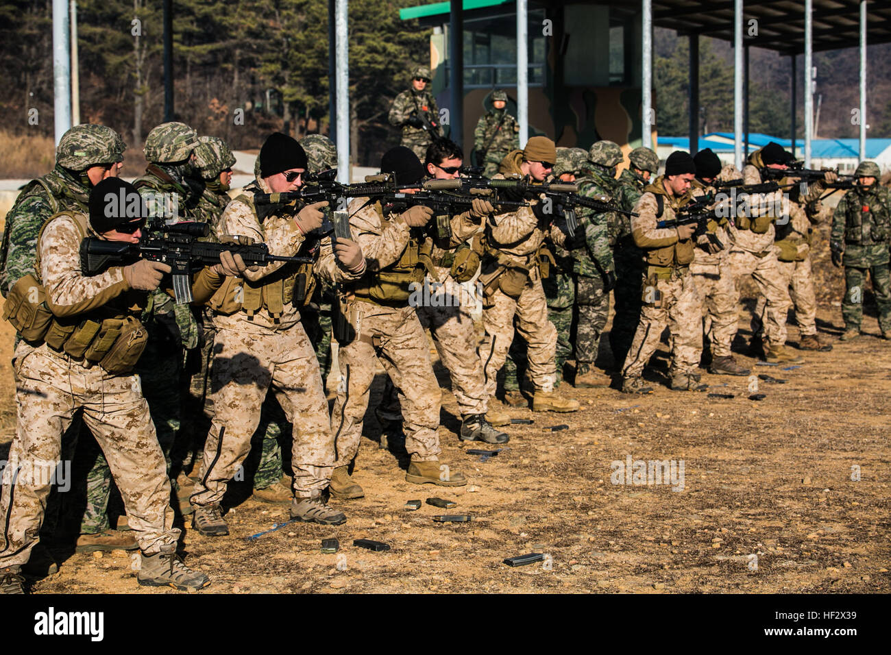 U.S. Marines practice and demonstrate reloading in preparation for the ...