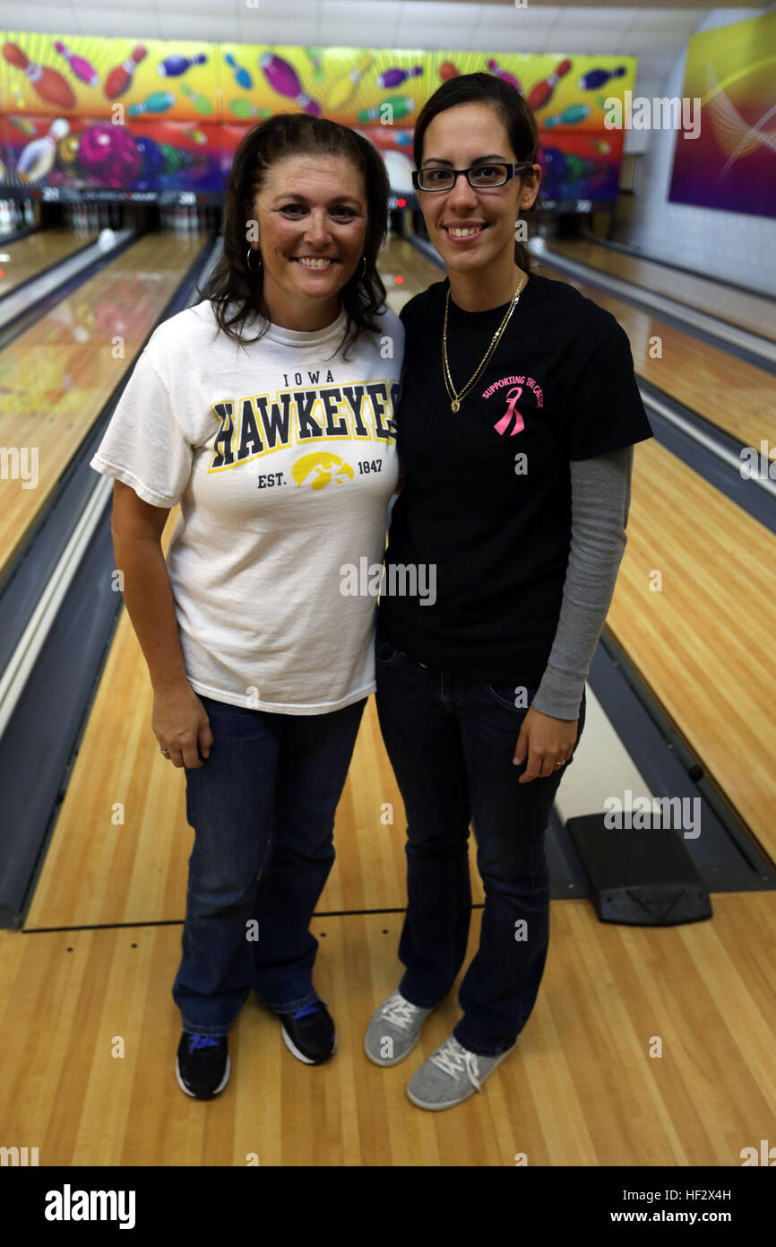 Two finalists stand together after a women’s division nine-pin no-tap ...