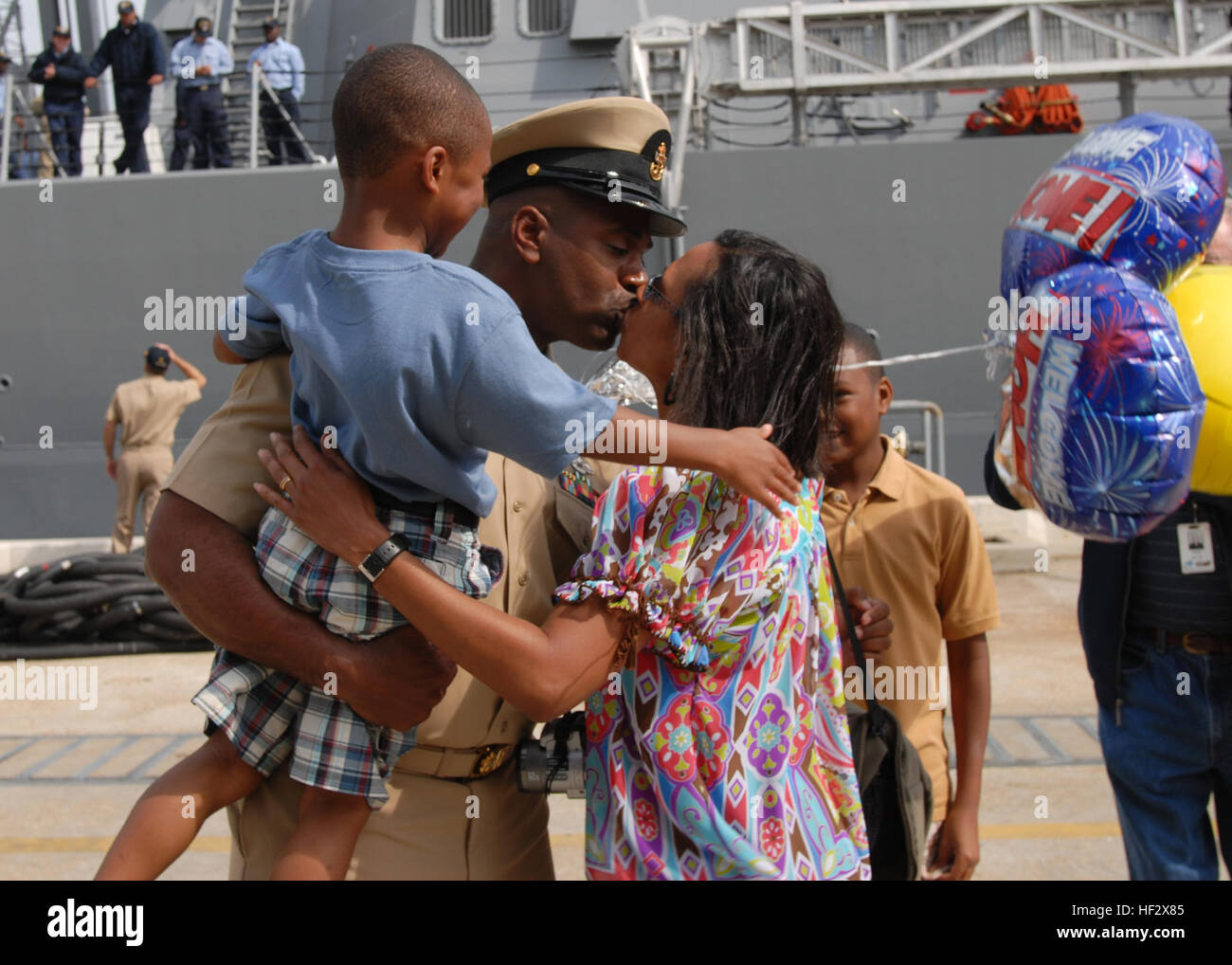 Chief Petty Officer Tony Ward, a hospital corpsman, greets his family ...