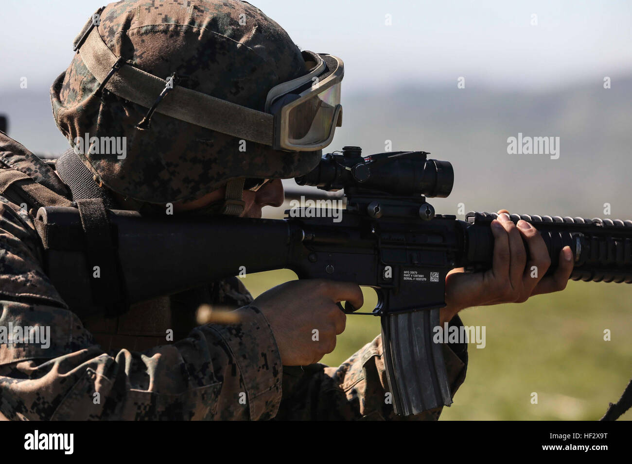 A U.S. Marine from Combat Logistics Battalion 15, 15th MEU, engages ...
