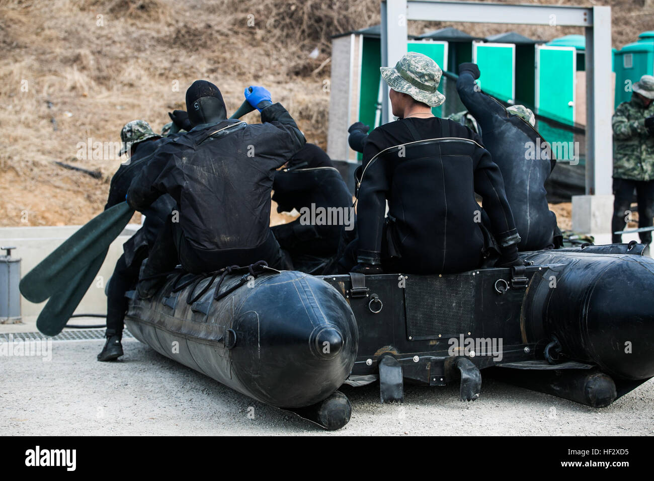 Republic of Korea Marines practice using their oars in unison while ...