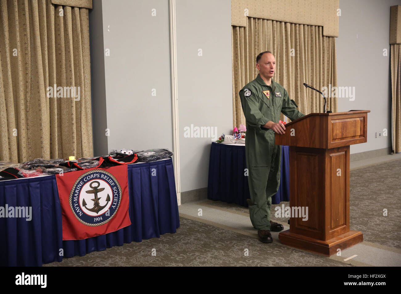 Col. Chris Pappas III speaks to an audience of Marines, Sailors and ...