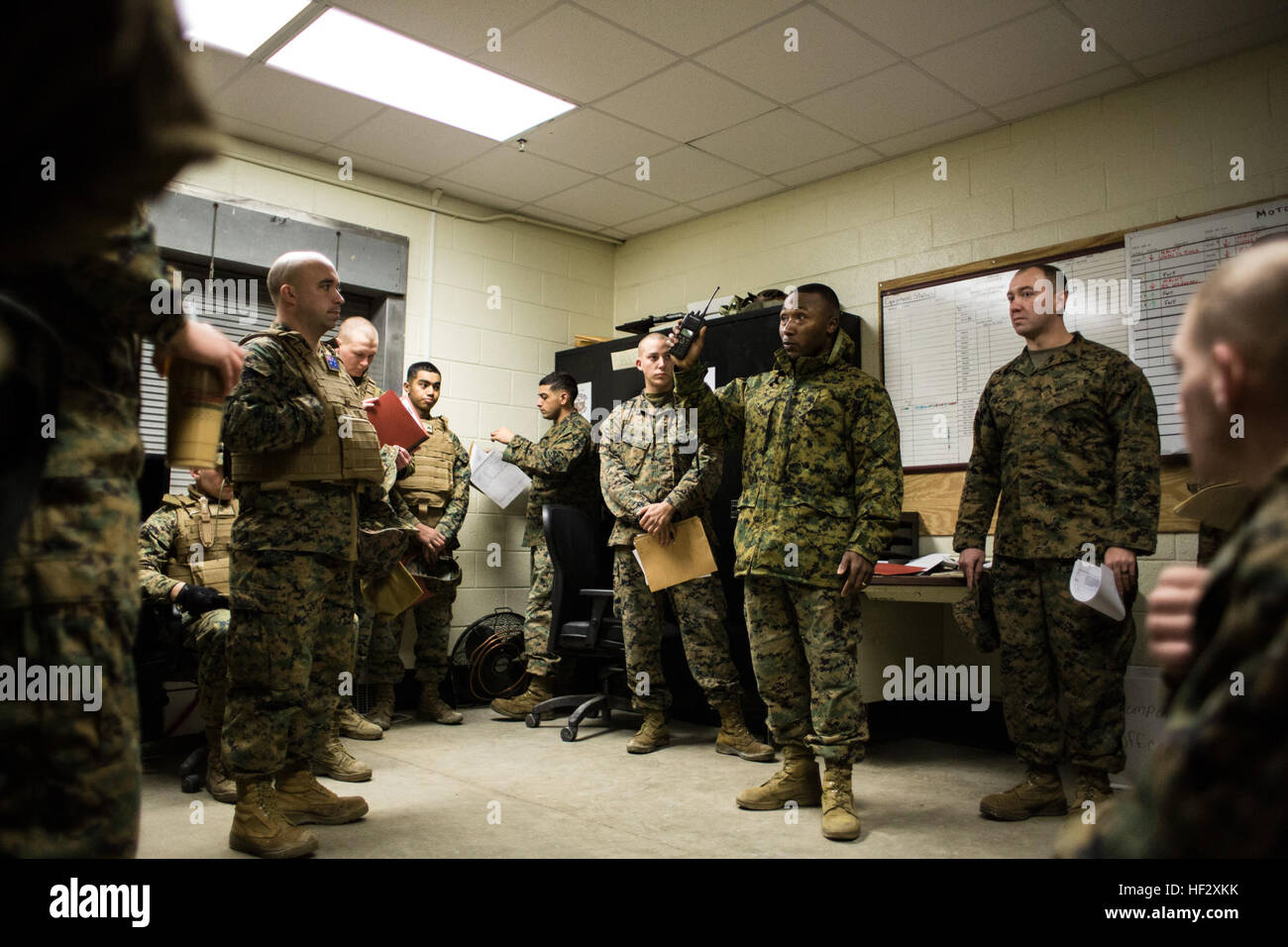 A logistics Marine delivers a pre-convoy briefing at Marine Corps Air ...