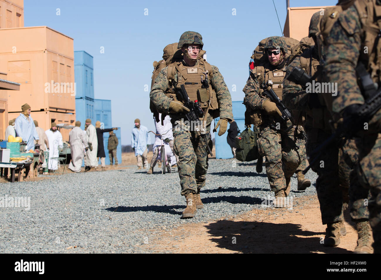 U.S. Marine Corps 2nd Lt. Matthew Dunlevy, center, platoon commander ...