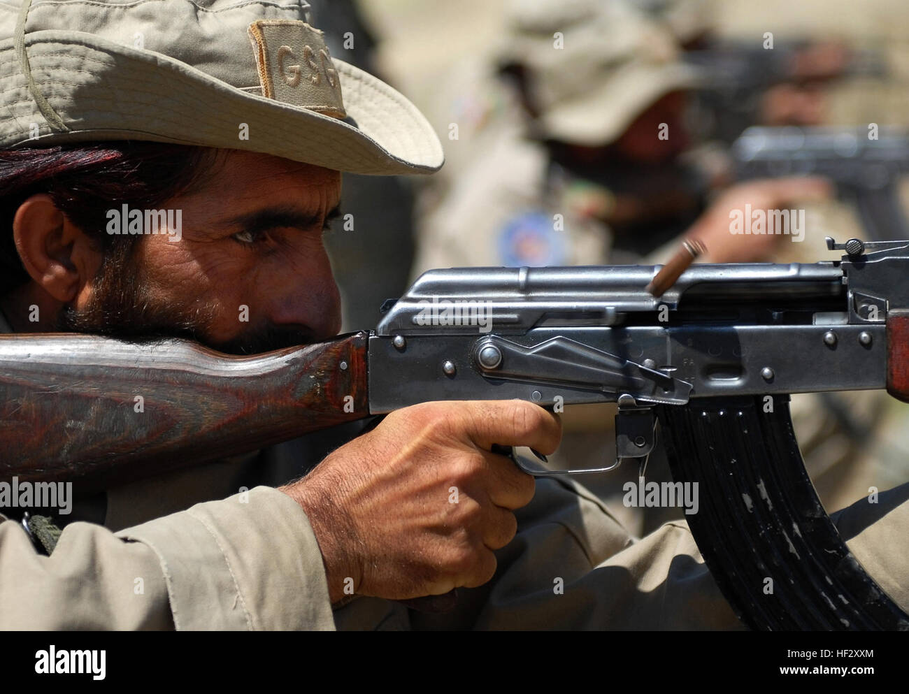 An Afghan security guard, assigned to Forward Operating Base Torkham ...