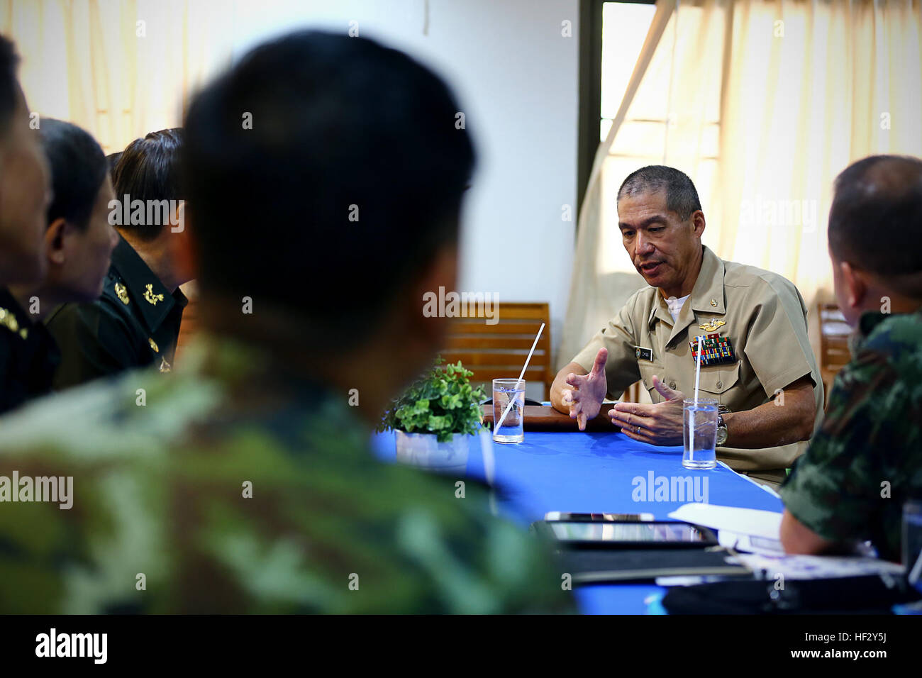 U.S. Pacific Command Surgeon General Rear Adm. Colin Chinn, center ...
