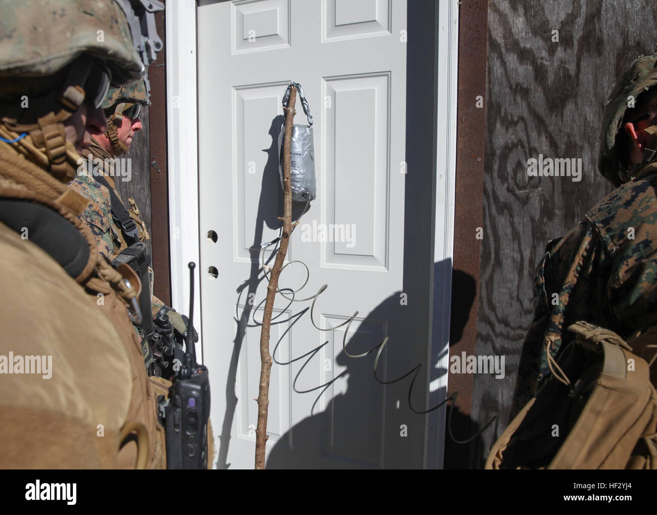 Marines with 2nd Combat Engineer Battalion set up an explosive charge ...