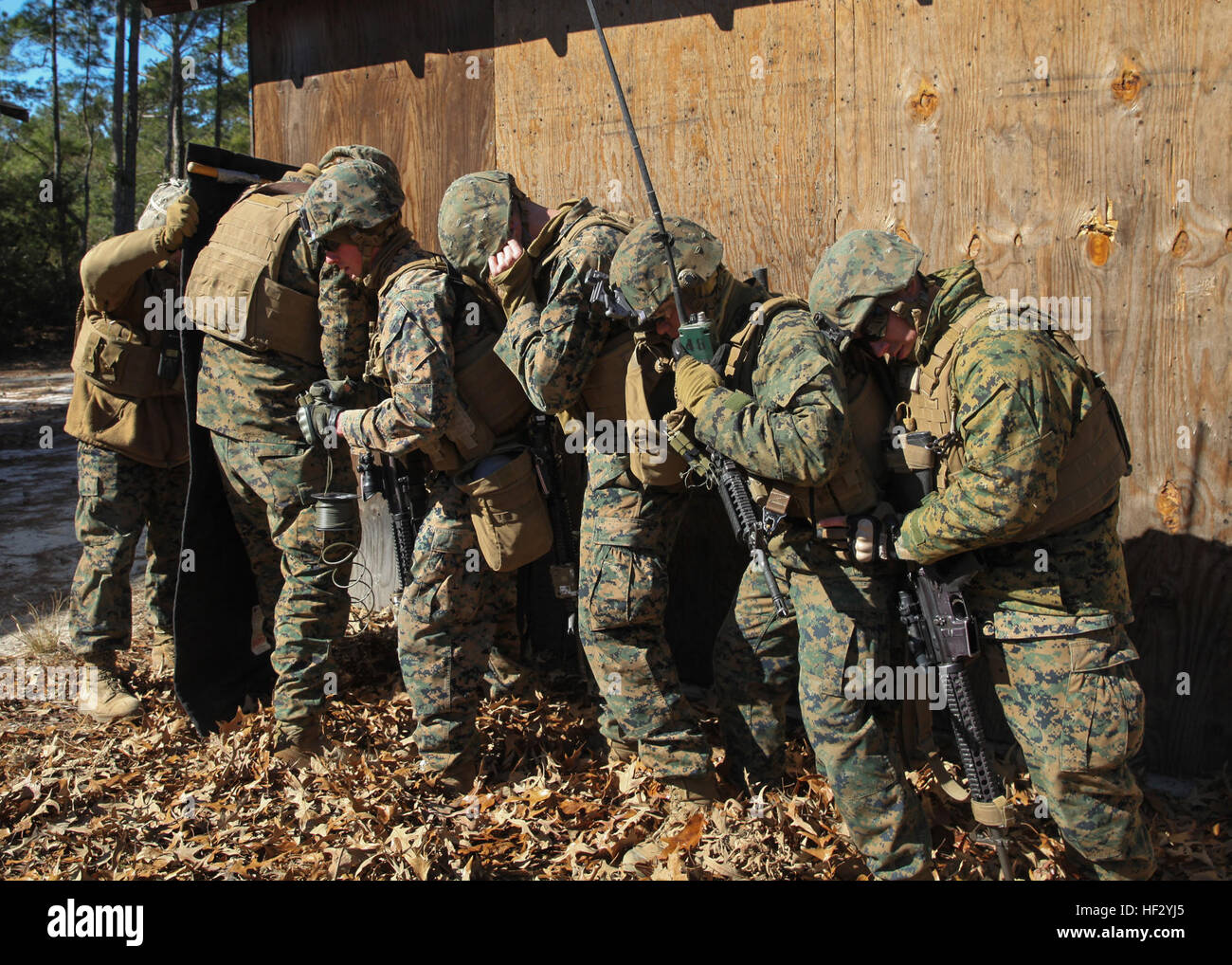 Marines of 2nd Combat Engineer Battalion take cover and brace ...