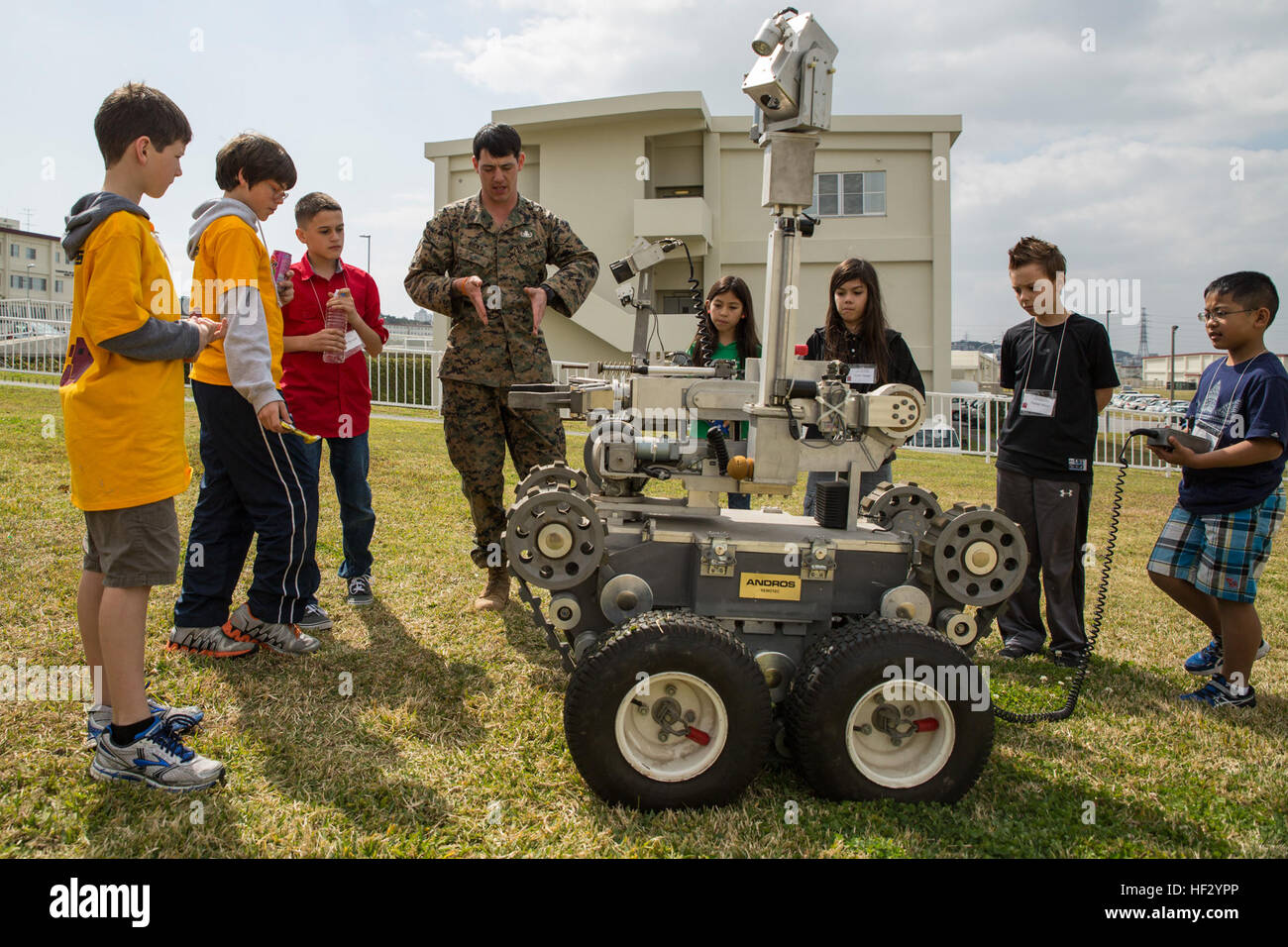 Sgt. Larry K. Hicks, fourth from left, explains the capabilities of a ...