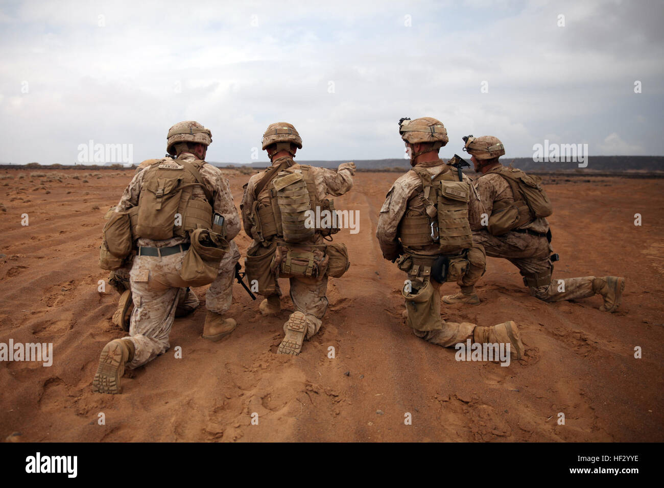 Sergeant Joshua A. Hurley, second from left, a squad leader with ...
