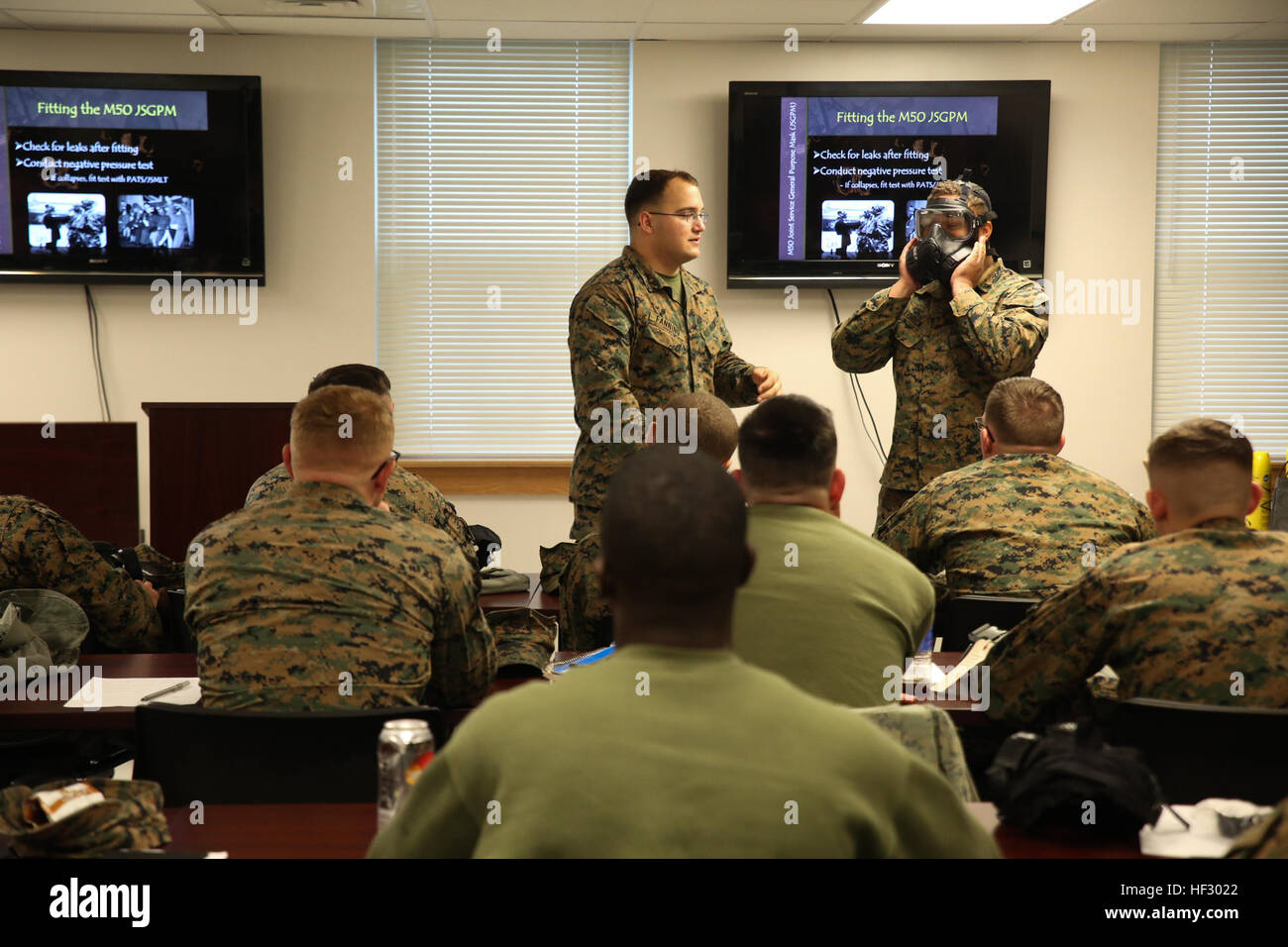 Lance Cpl. Justin Fanning (center), a chemical, biological ...