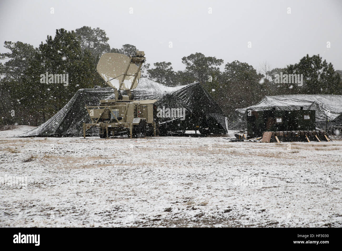 Snow falls over the command operations center during an entire day of a ...