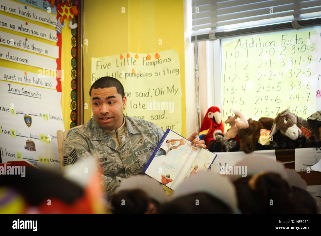 U.S. Air Force Tech. Sgt. Archie Mason reads to kindergartners at the ...