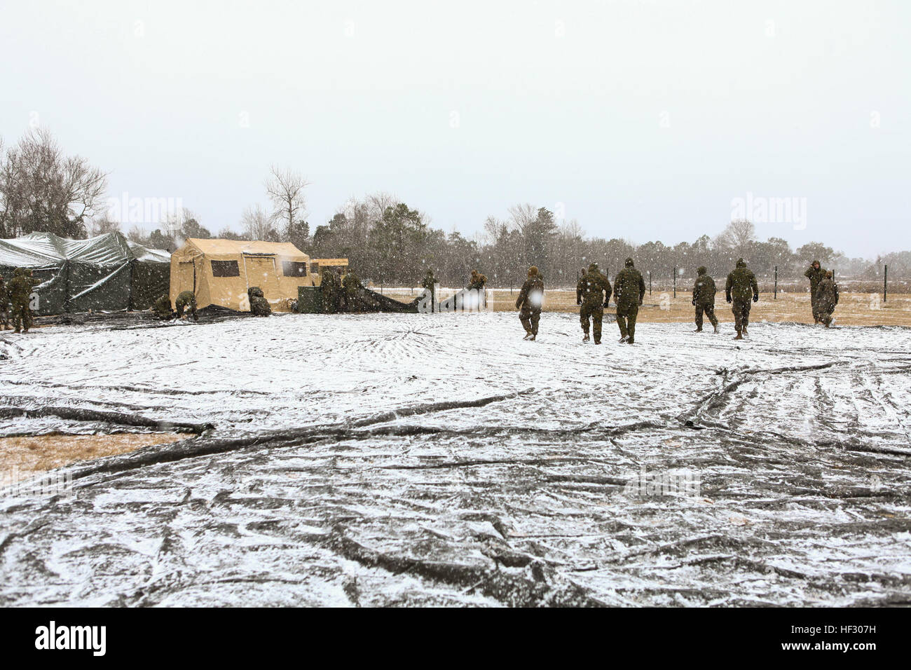 U.S. Marines assigned to Marine Wing Support Squadron (MWSS) 274 lay ...