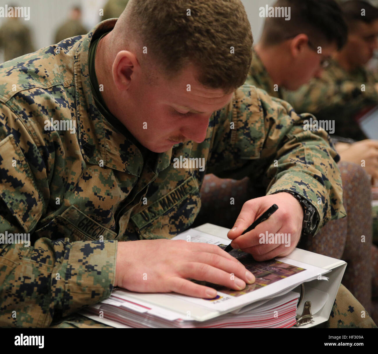 A Marine with Black Sea Rotational Force, plots points on a map during ...