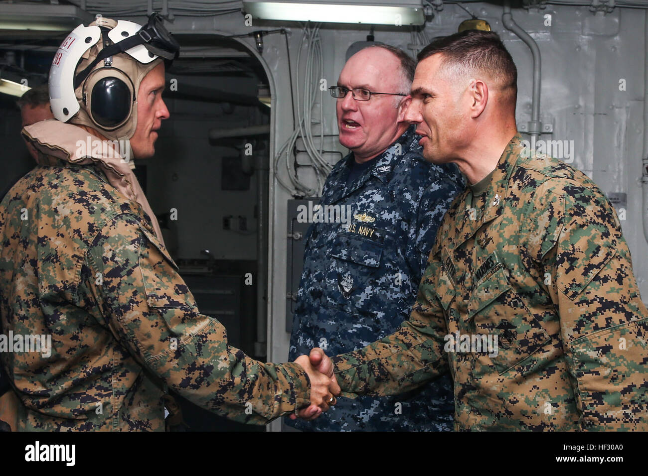 U.S. Marine Maj. Gen. Carl E. Mundy III, left, greets Col. Vance L ...