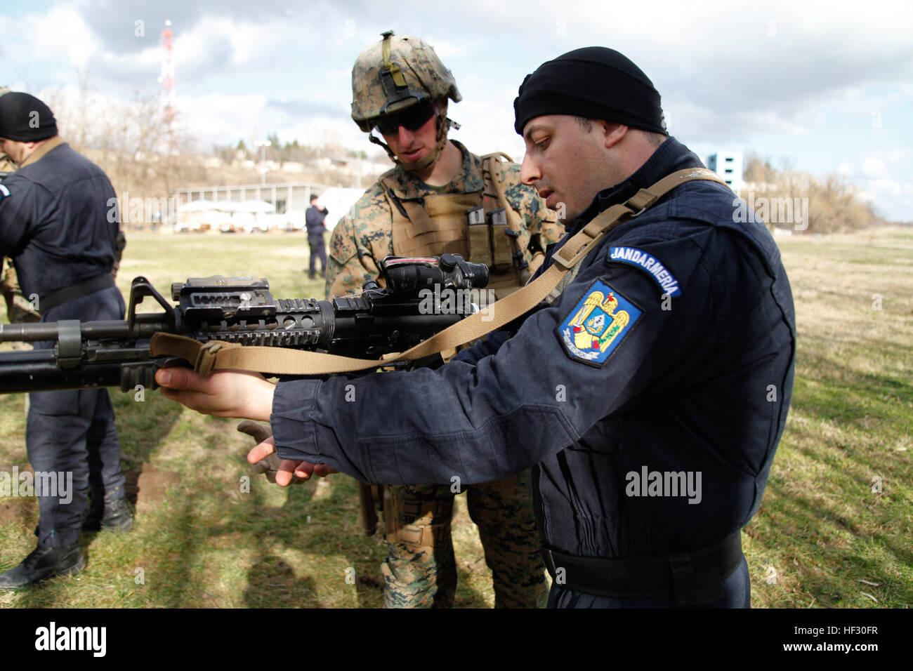U.S. Marine Lance Cpl. Michael Logan from Alpha Fleet Anti-terrorism ...