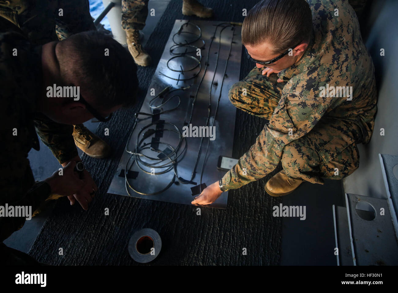 U.S. Marines with the Explosive Ordnance Disposal Detachment, Combat ...
