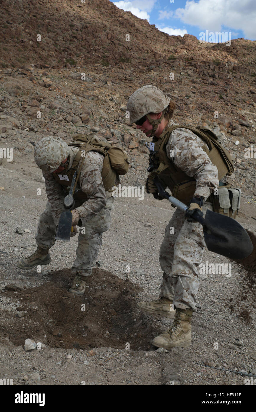 Sgt. David Y. Yakubovsky and Cpl. Jennifer M. Arnett, combat engineers ...