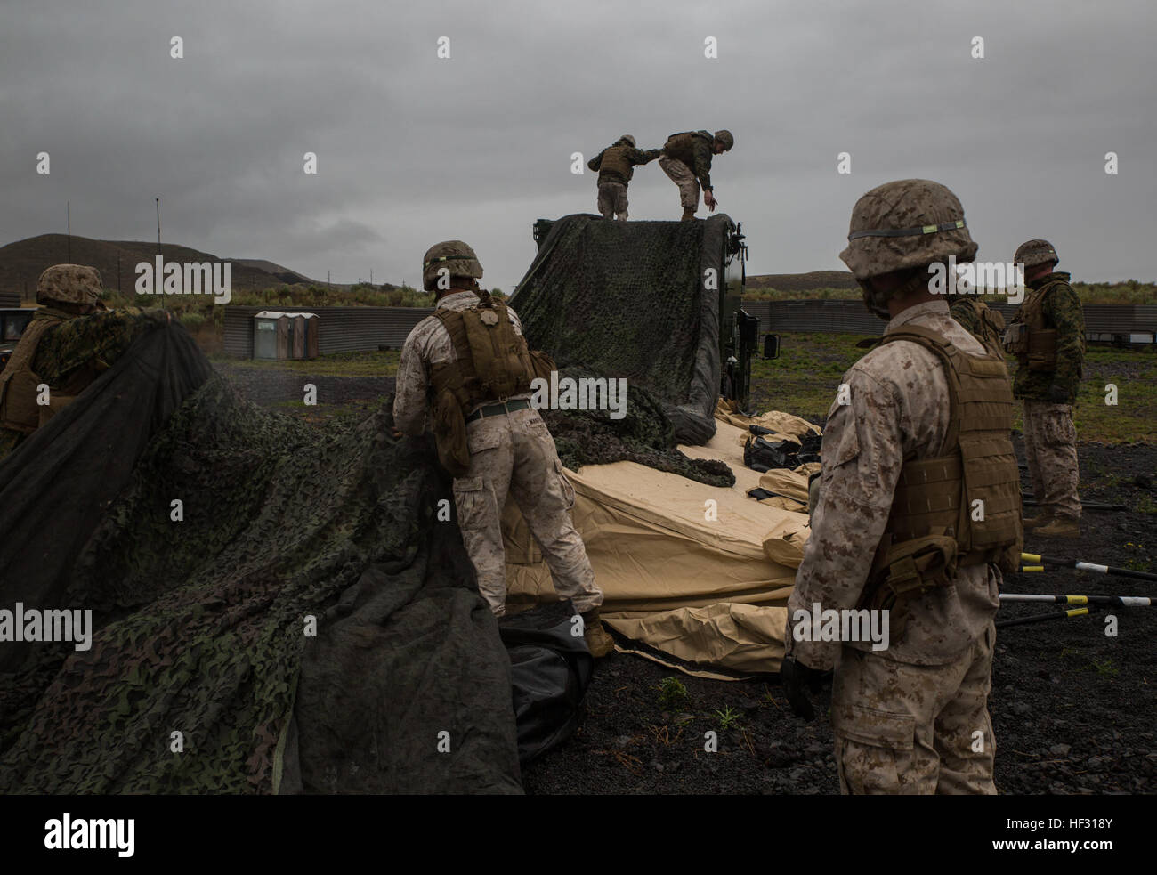 Marines work together to pack up the forward command element, swiftly ...