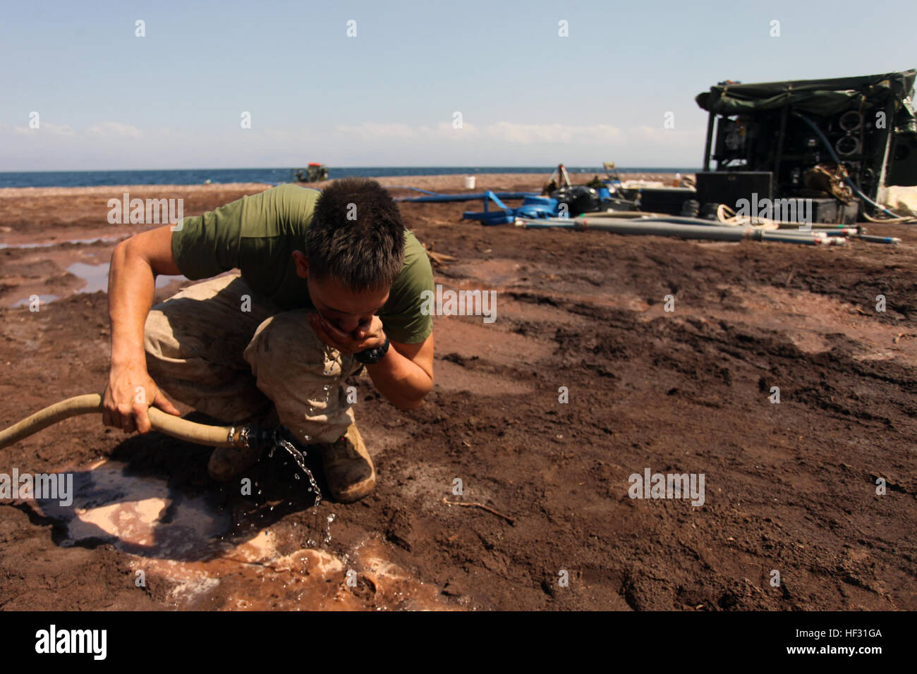 Corporal Ryan G. Schmidt, a water purification specialist with Combat ...