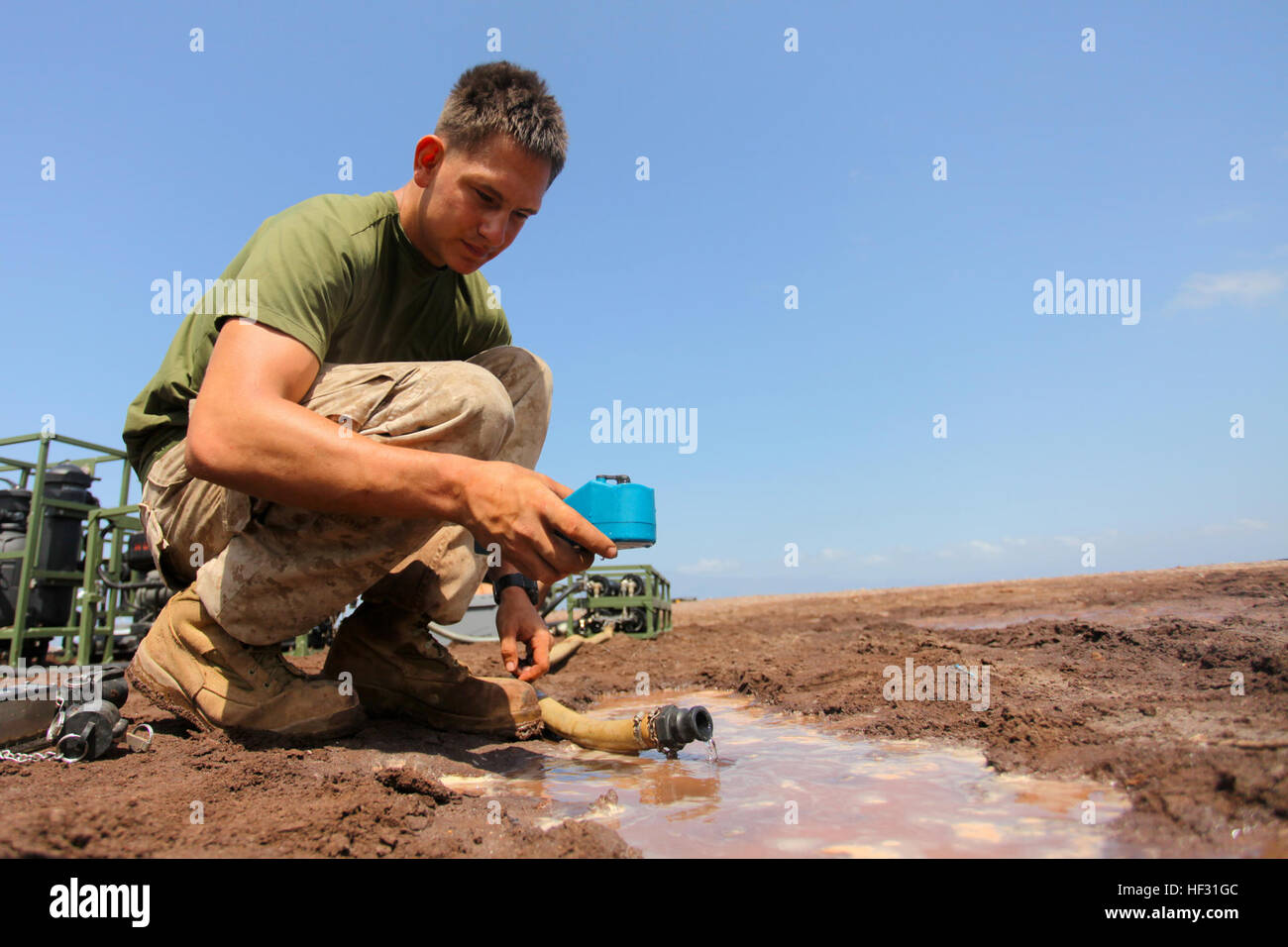 Corporal Ryan G. Schmidt, a water purification specialist with Combat ...