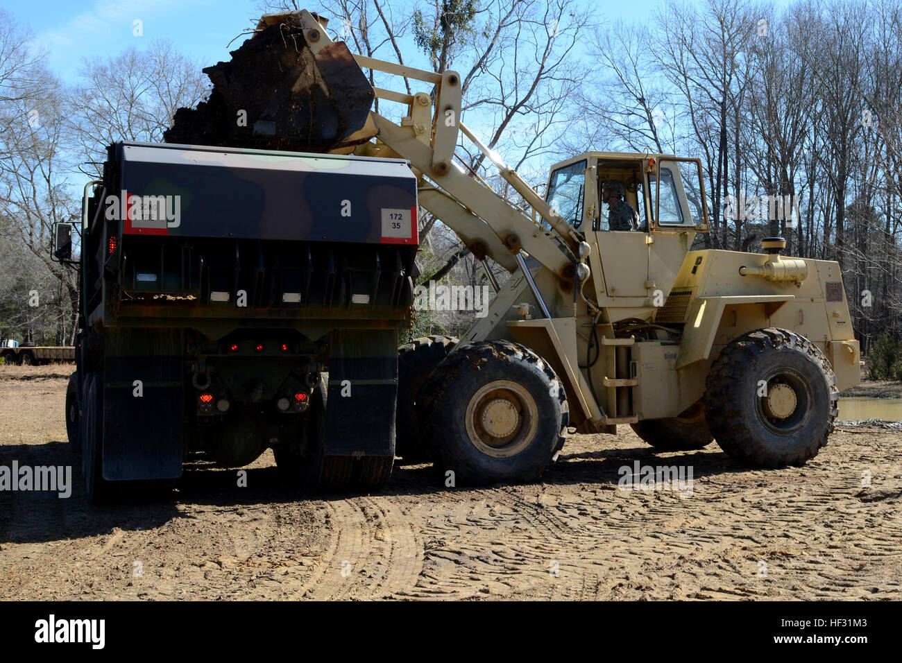 U.S. Army Staff Sgt. Kevin Hicklin, a heavy equipment operator assigned ...
