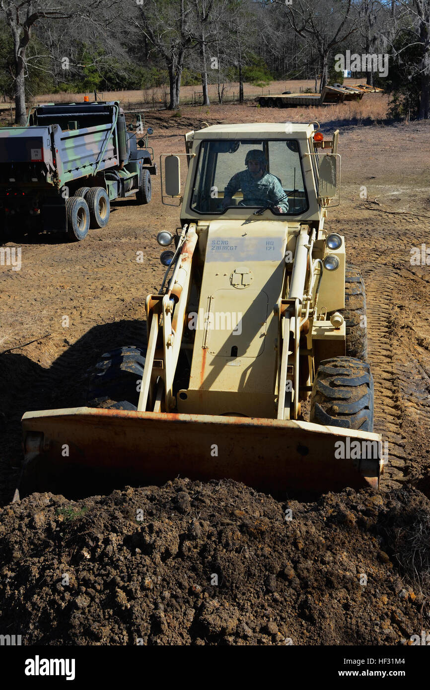 U.S. Army Staff Sgt. Kevin Hicklin, a heavy equipment operator assigned ...