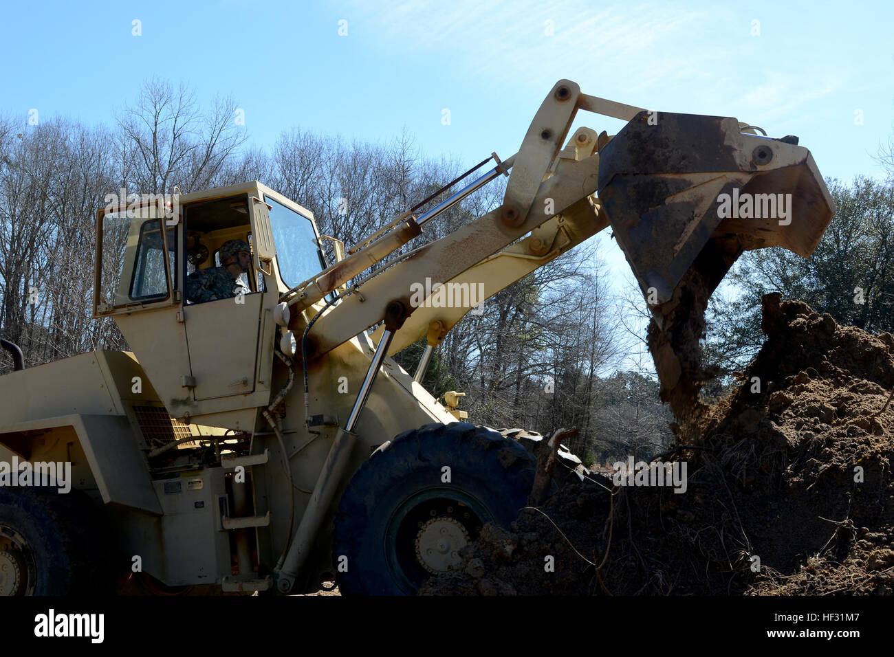 U.S. Army Staff Sgt. Kevin Hicklin, a heavy equipment operator assigned ...