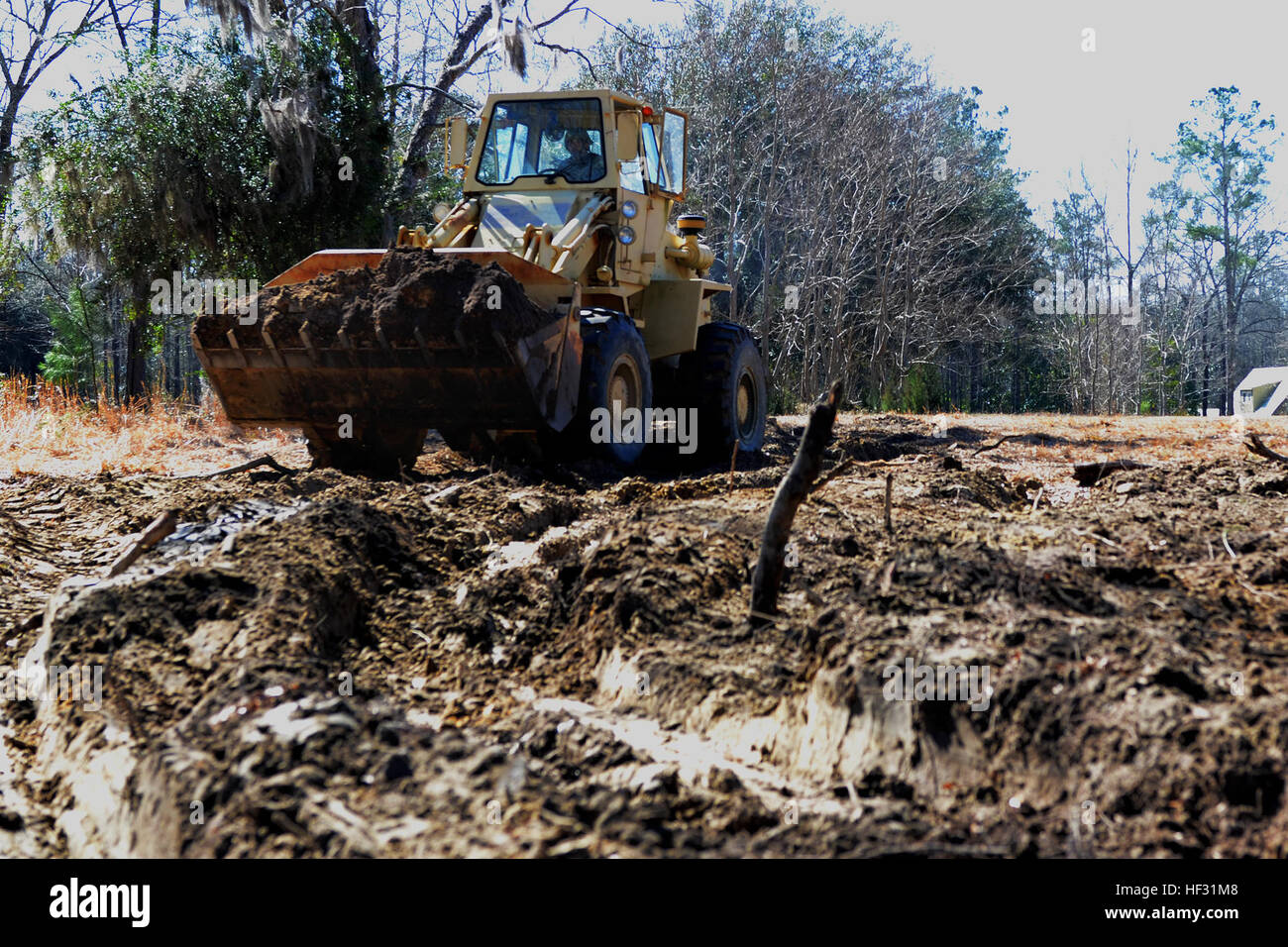U.S. Army Staff Sgt. Kevin Hicklin, a heavy equipment operator assigned ...