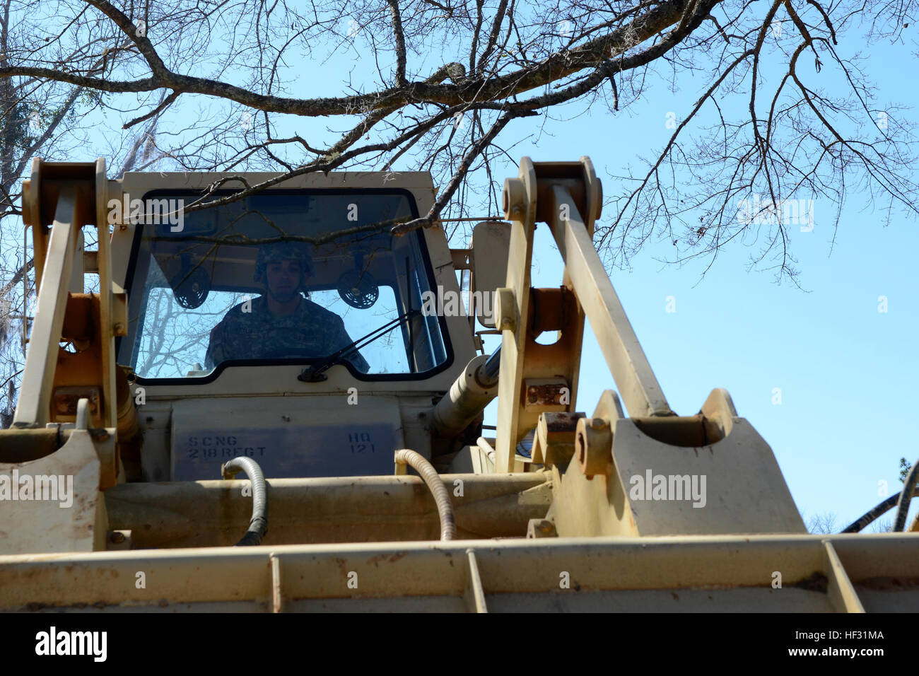 U.S. Army Staff Sgt. Kevin Hicklin, a heavy equipment operator assigned ...