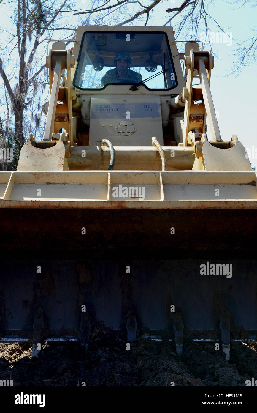U.S. Army Staff Sgt. Kevin Hicklin, a heavy equipment operator assigned ...