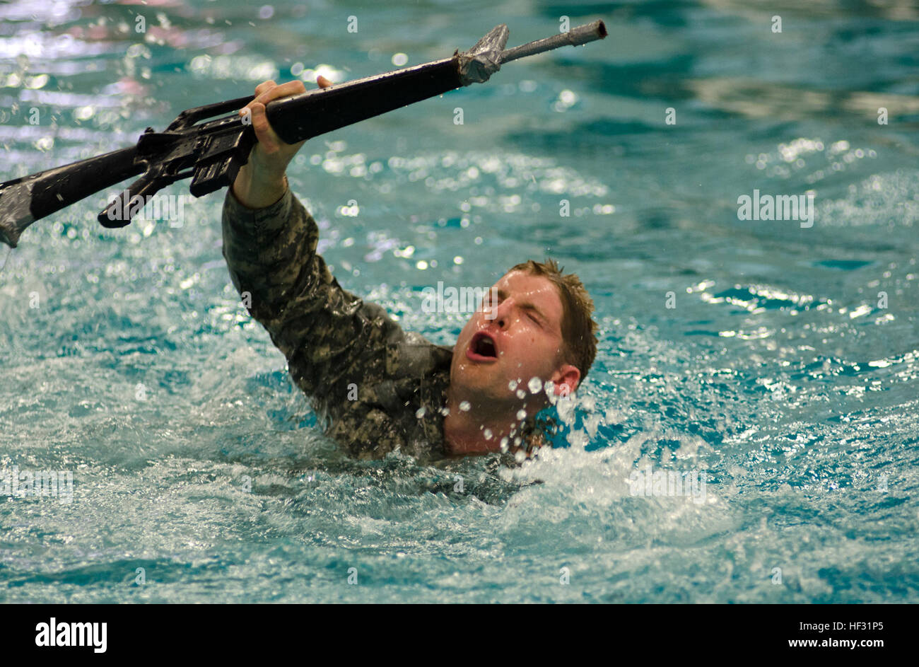 Sgt. Joshua Norberg, of the 741st Ordnance Disposal Battalion, swims ...
