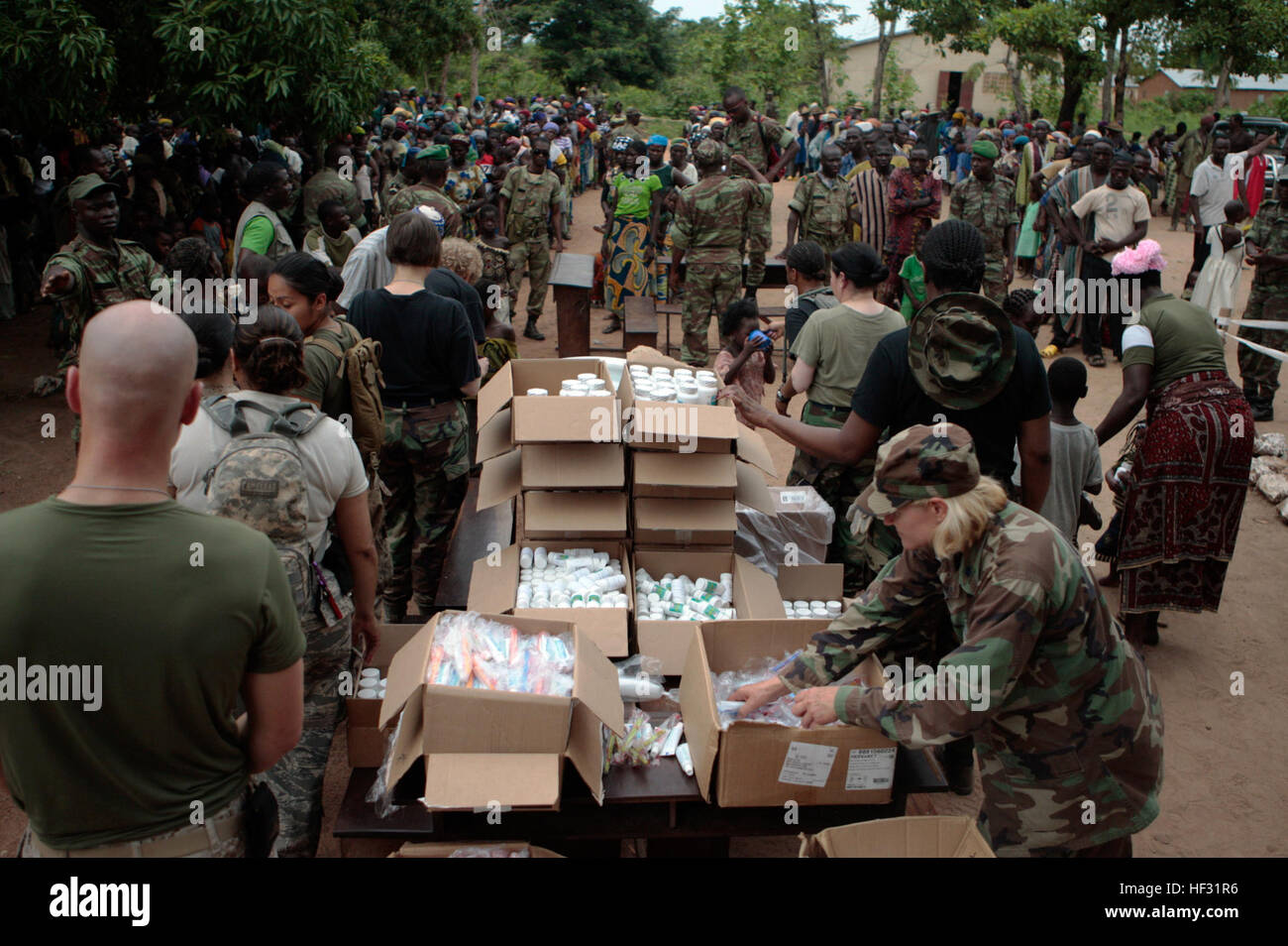 Villagers in Wanrarou, Benin, attend a community service project during ...