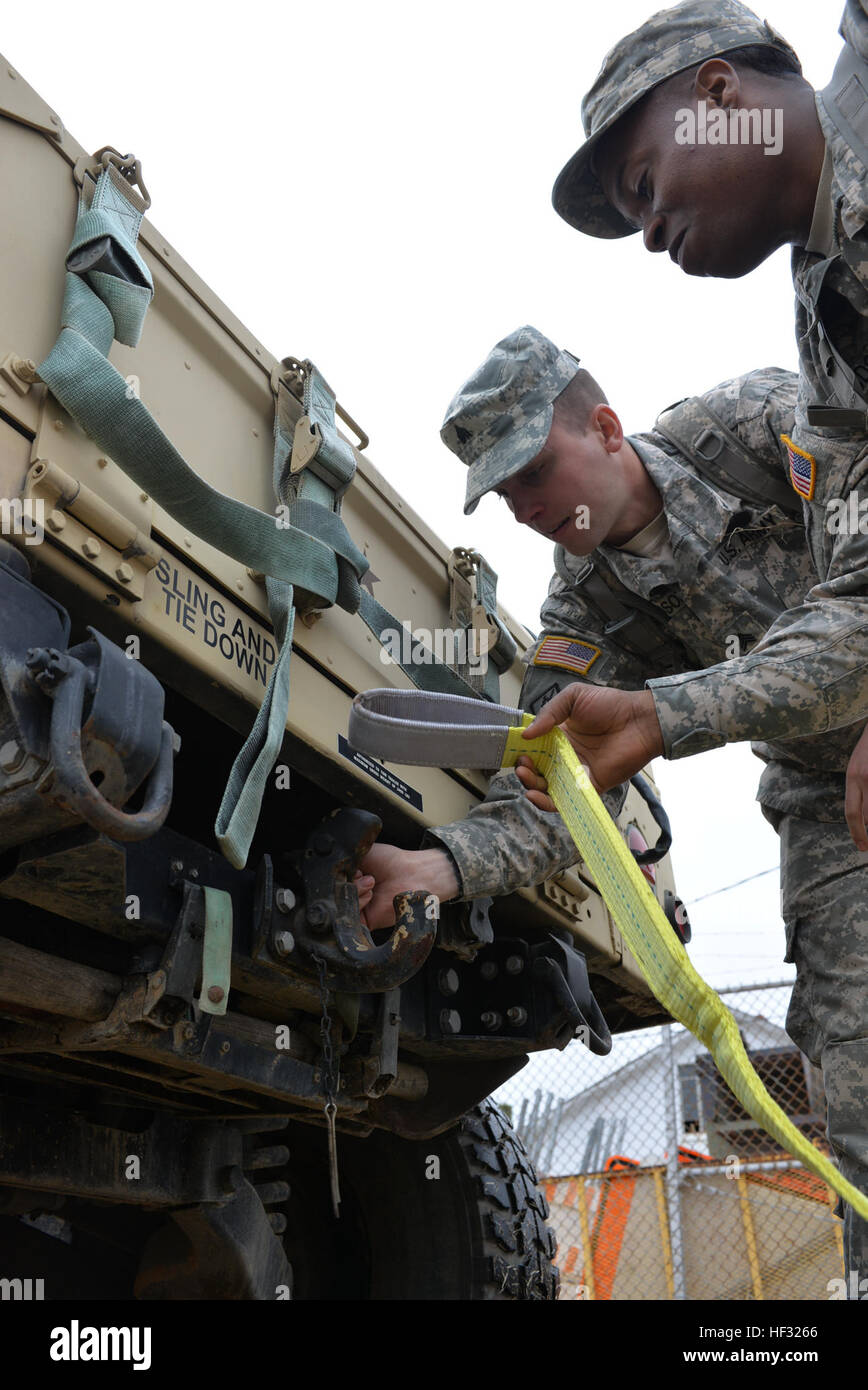 Soldiers of the 105th Engineer Battalion complete chainsaw, sandbag ...