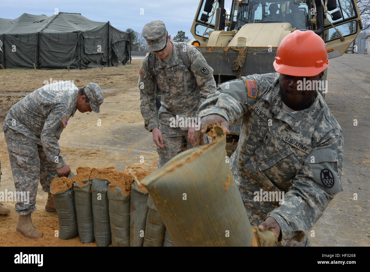 Soldiers of the 105th Engineer Battalion complete chainsaw, sandbag ...