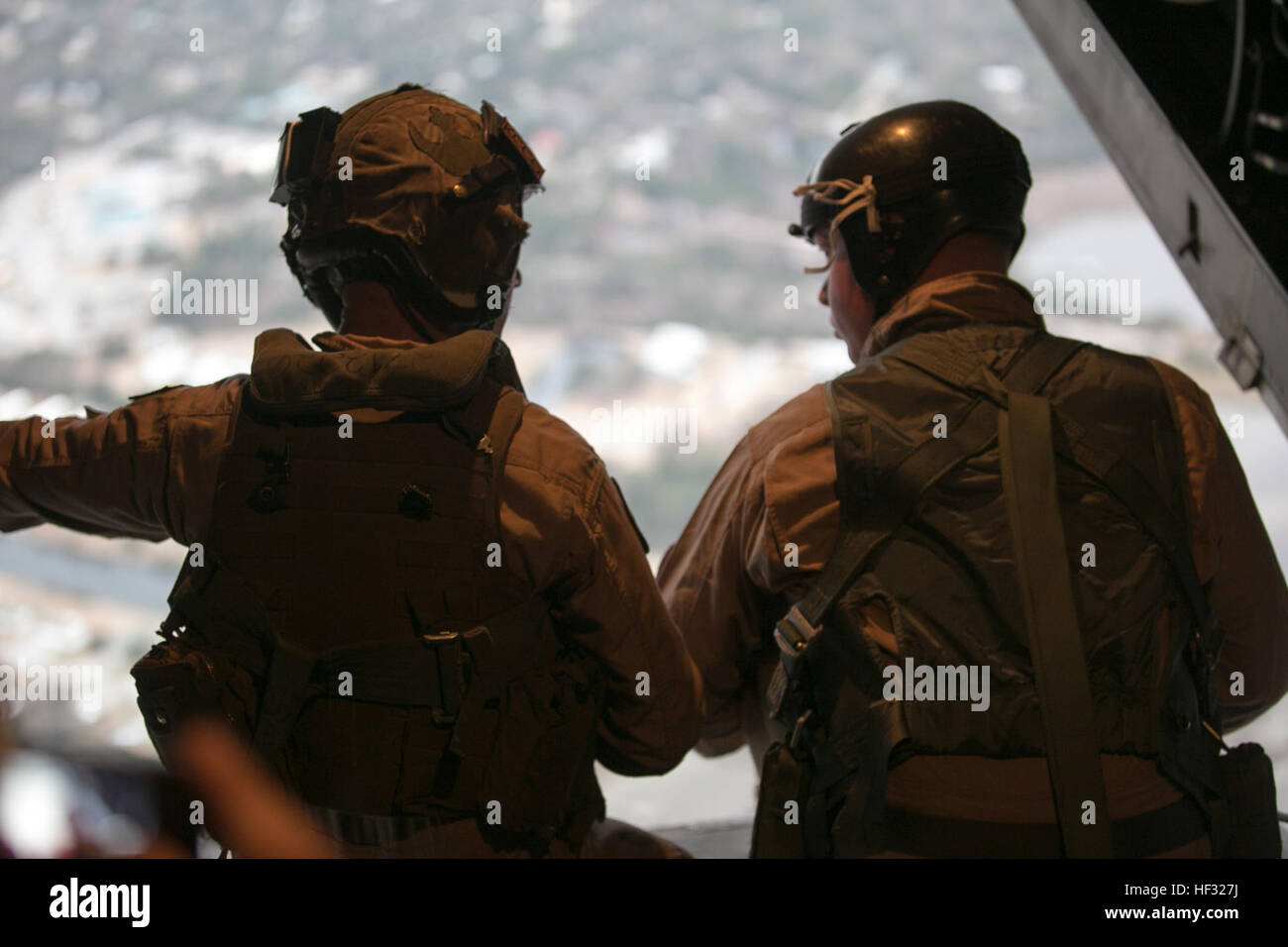 Corporal Tyler Savely, left, a crew chief with Marine Medium Tiltrotor ...