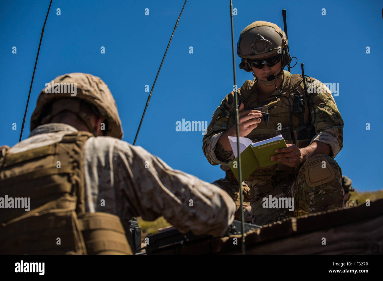 Air Force Staff Sgt. Craig R. Gabrielson (Right) works with Marine ...