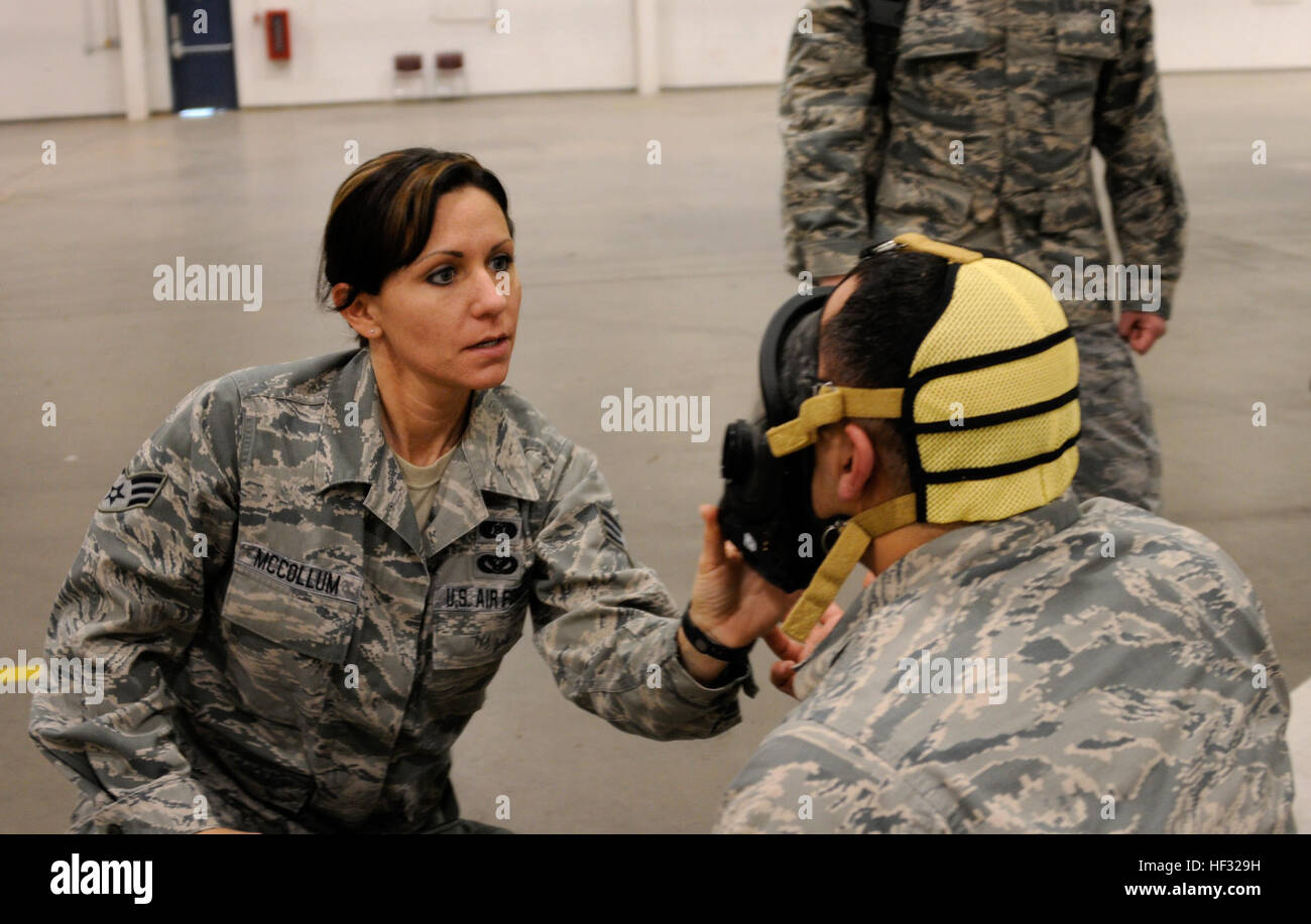 Senior Airman Amanda McCollum conducts a buddy check on Airman 1st ...