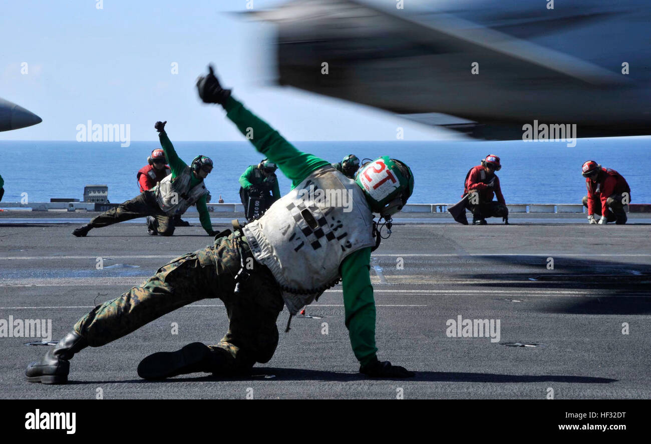 F/A-18 aircraft from Marine Strike Fighter Squadron 312 launches from ...