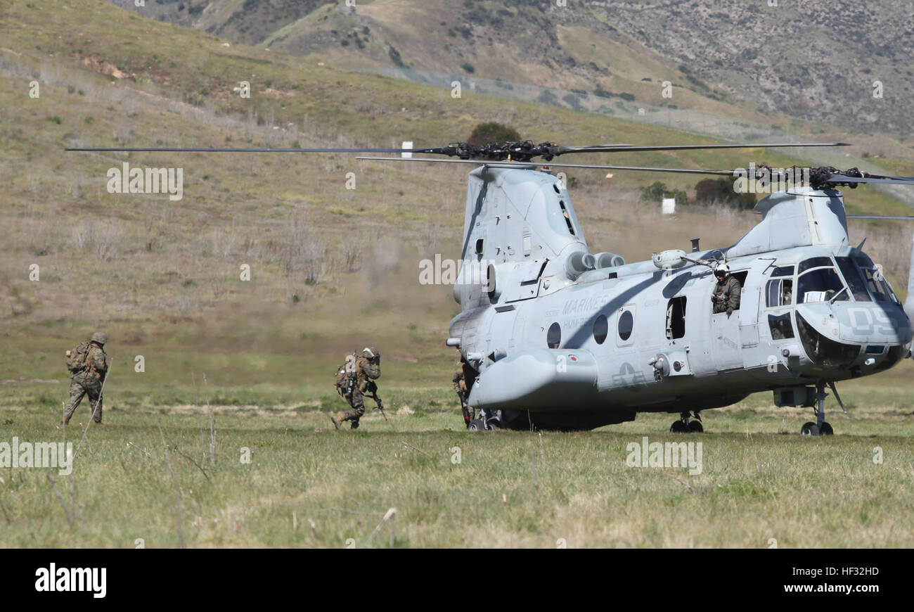 Marines from 1st Tank Battalion quick reaction force board a CH-46 ...