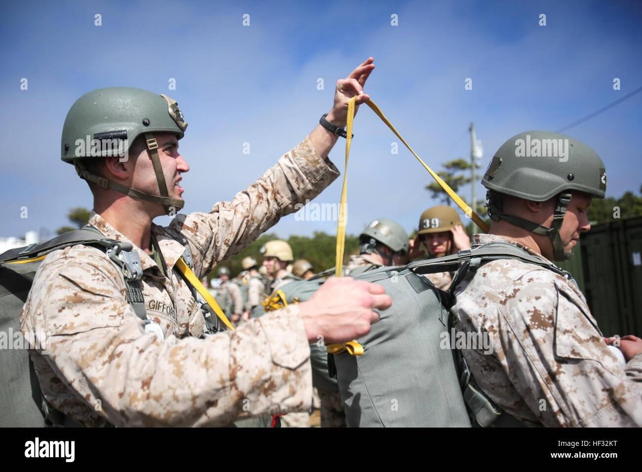 Sgt. Alex Gifford (left), a reconnaissance Marine with 2nd ...