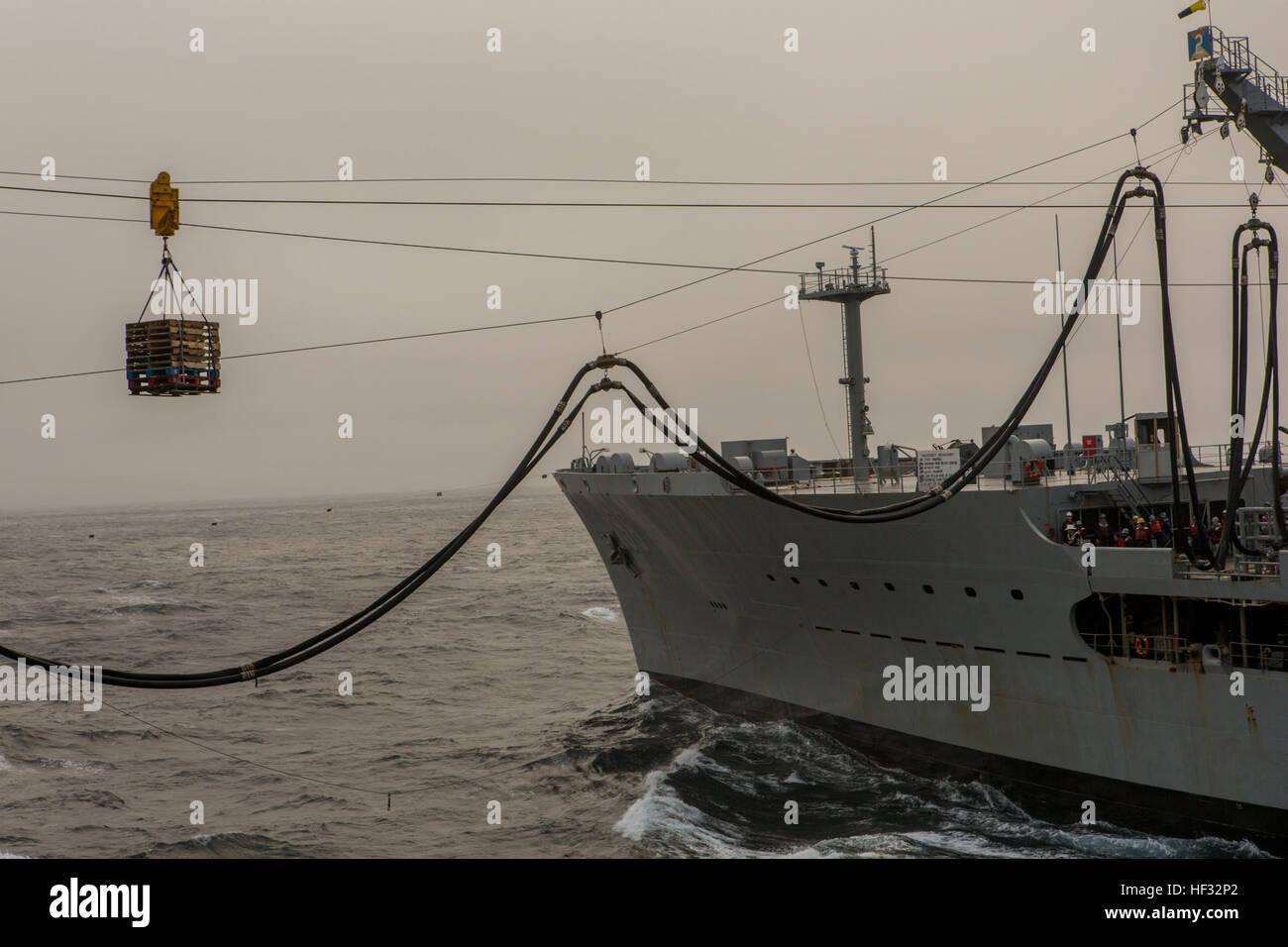 U.S. Navy sailors aboard the USS Arlington (LPD-24) amphibious ...