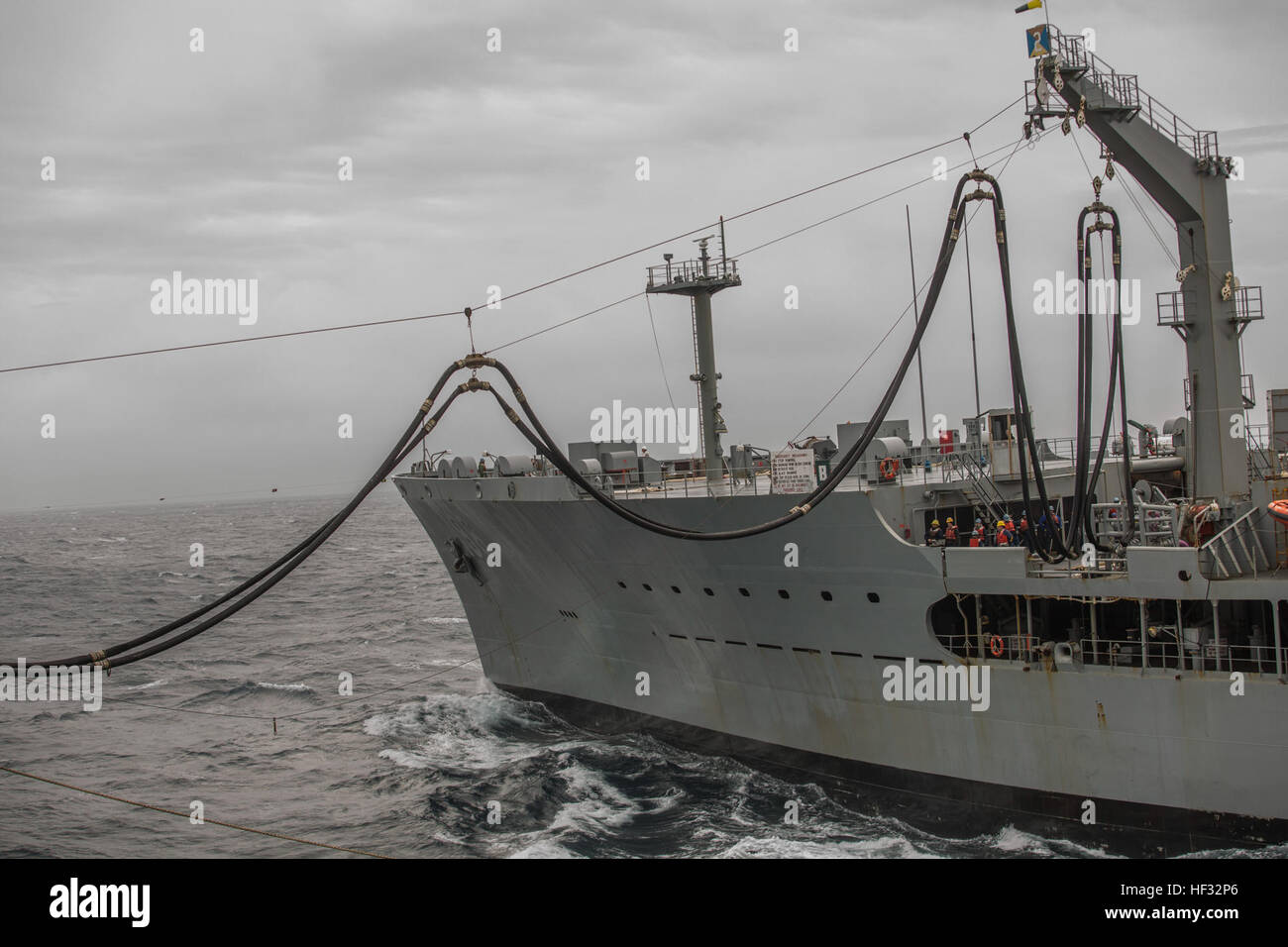 U.S. Navy sailors aboard the USS Arlington (LPD-24) amphibious ...