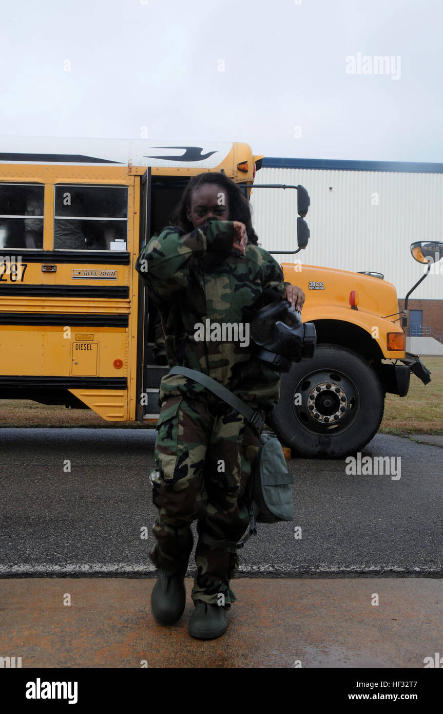 Airman 1st Class Kendrick, 187th Fighter Wing emergency manager, exits ...